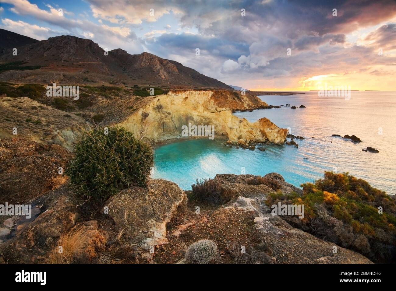 View of a typical coastline of south eastern Crete wit rugged mountains ...