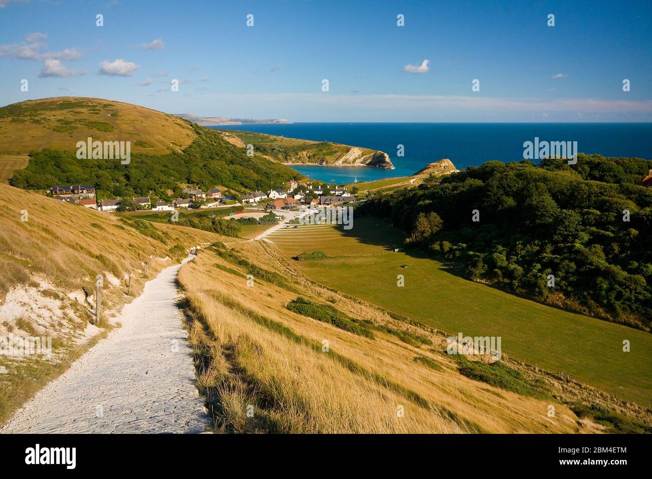 View of Lulworth village and Lulworth cove on Jurassic coast in ...