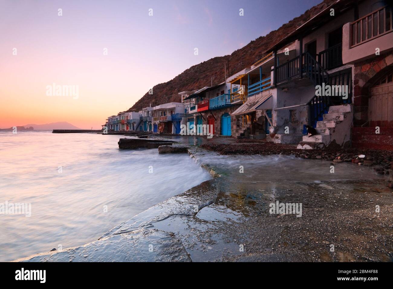 Boat houses in the Milos island, Cyclades, Greece Stock Photo - Alamy