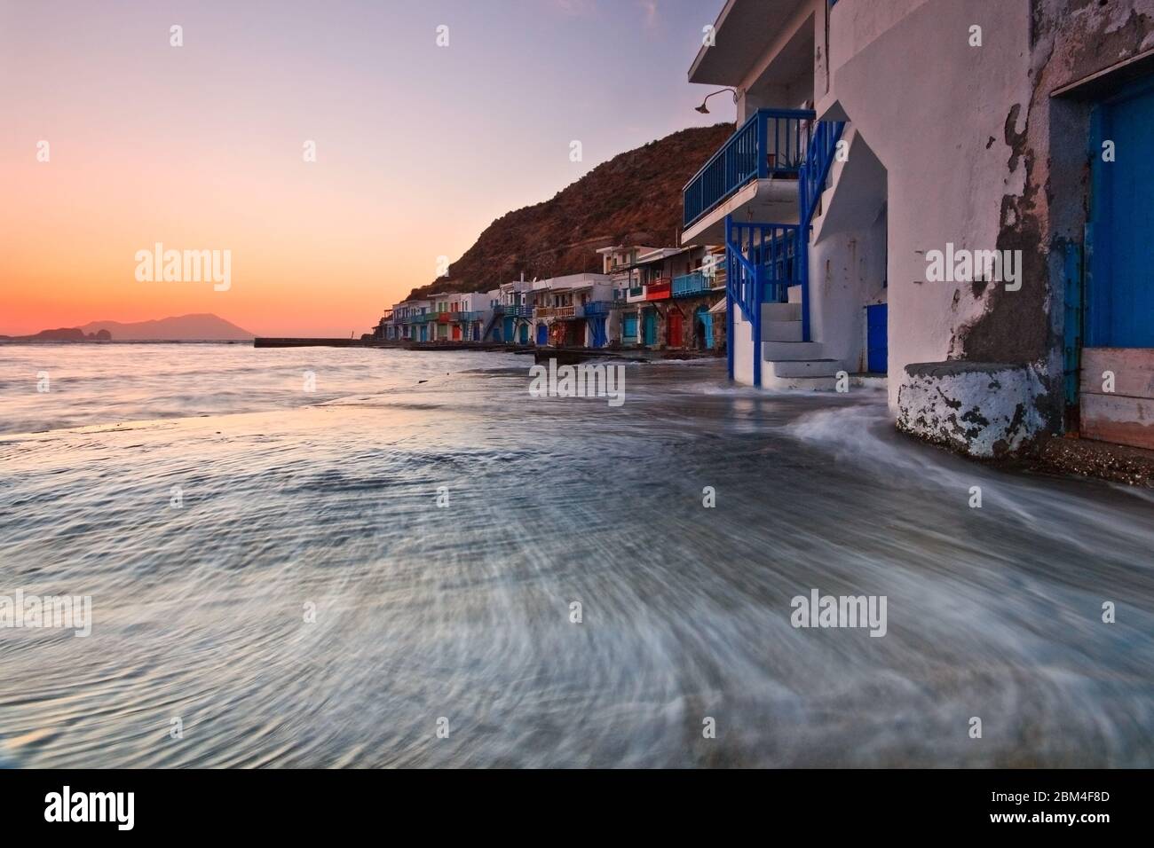 Boat houses in the Milos island, Cyclades, Greece Stock Photo - Alamy