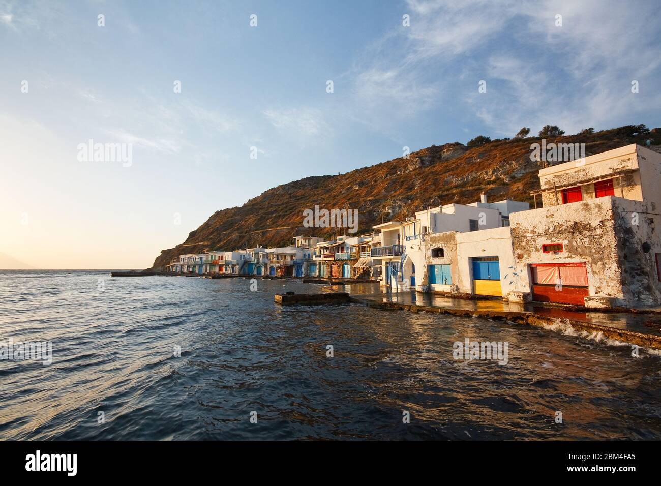 Boat houses in the Milos island, Cyclades, Greece Stock Photo - Alamy