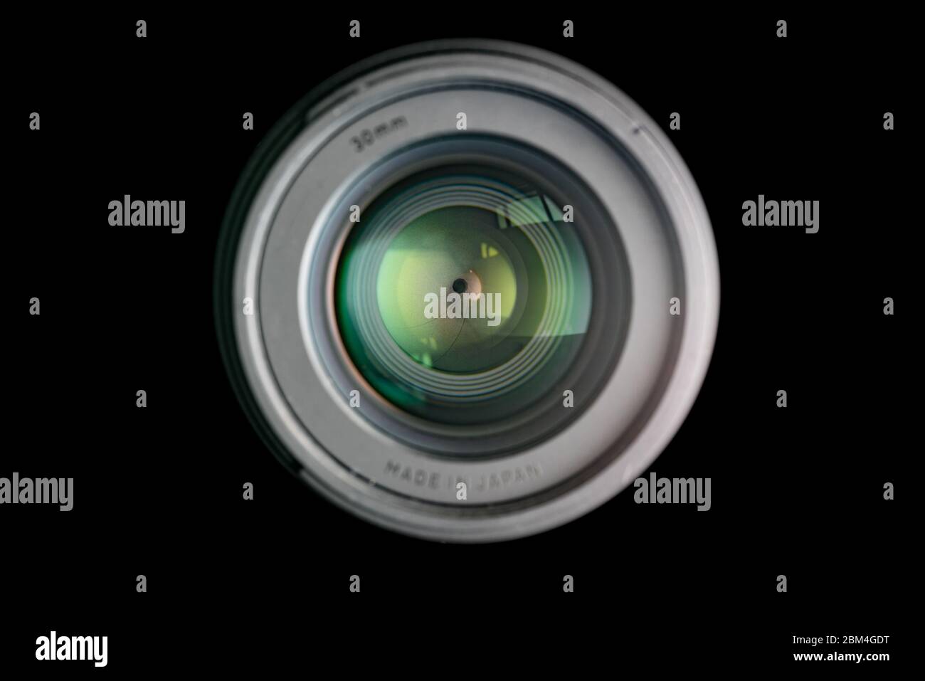 Front view of 30mm lens diaphragm on black background Stock Photo - Alamy