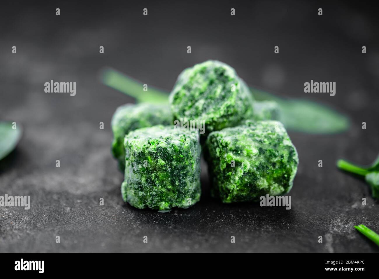 Frozen spinach cubes as detailed close up shot (selective focus Stock ...