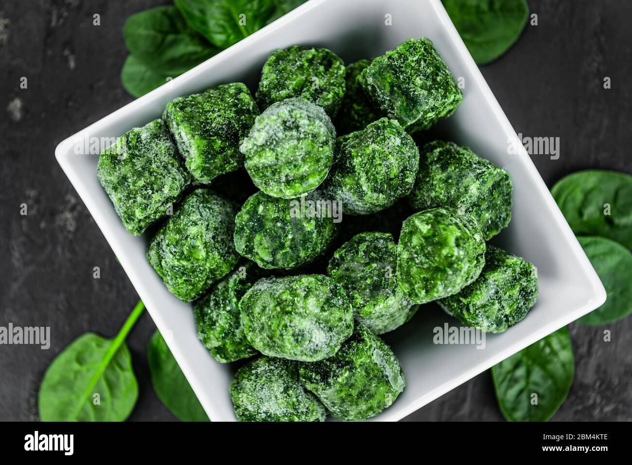Frozen spinach cubes as detailed close up shot (selective focus Stock ...