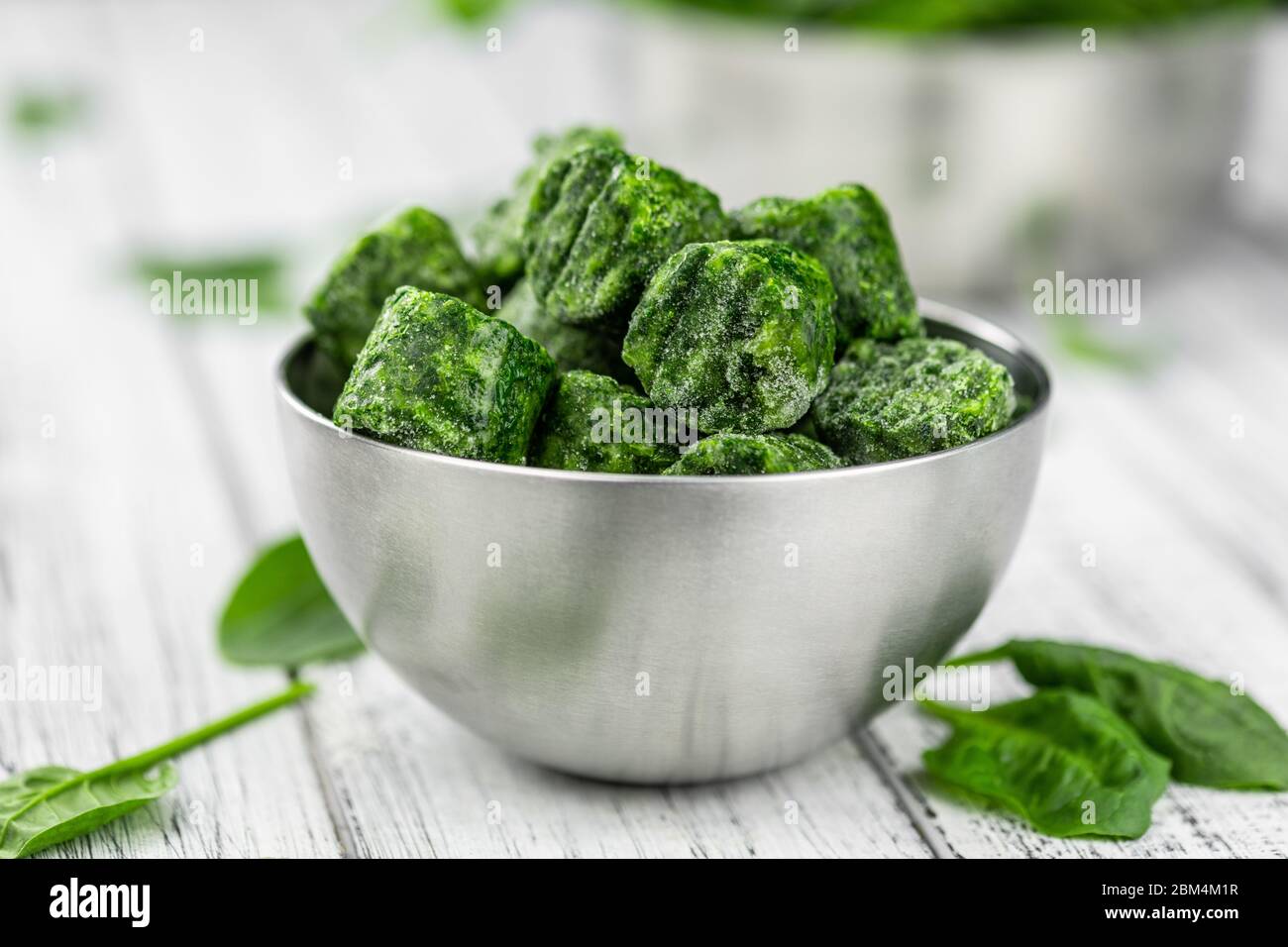 Frozen spinach cubes as detailed close up shot (selective focus Stock ...