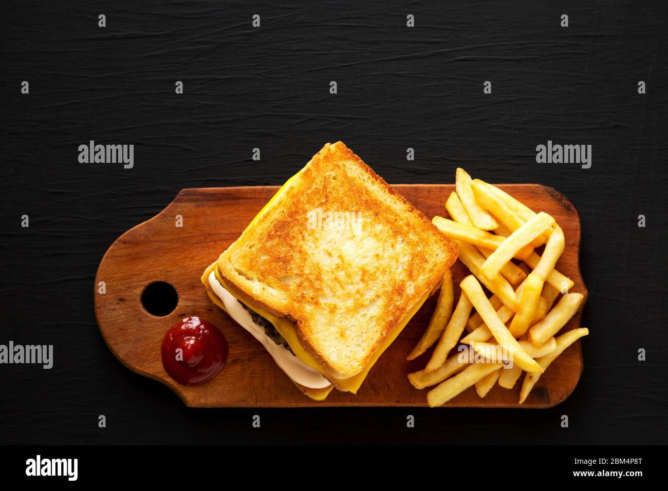 Cheeseburger with pickles from above hi-res stock photography and ...