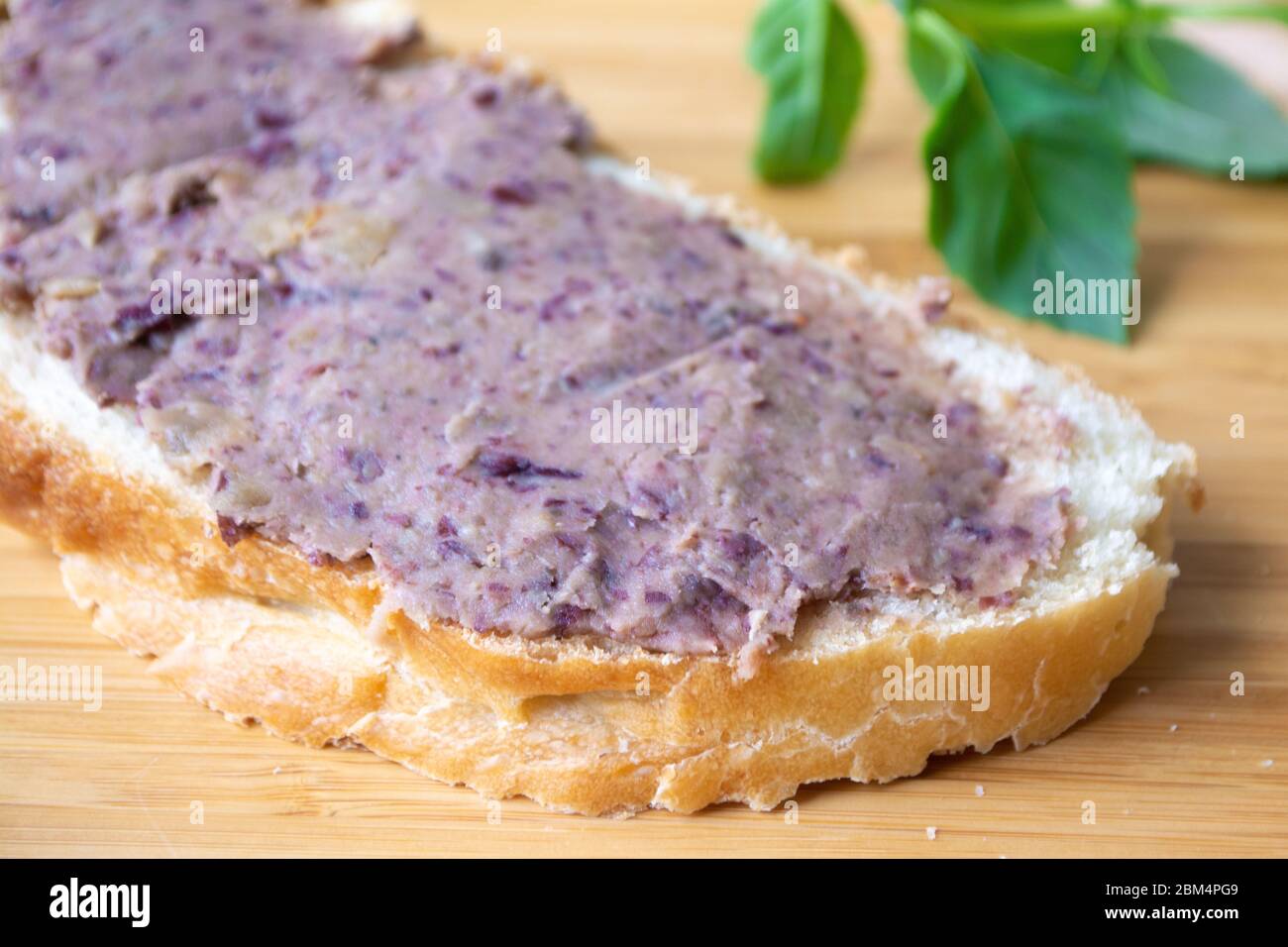 Vegan protein-packed bean pate paste spread on a slice of bread Stock ...