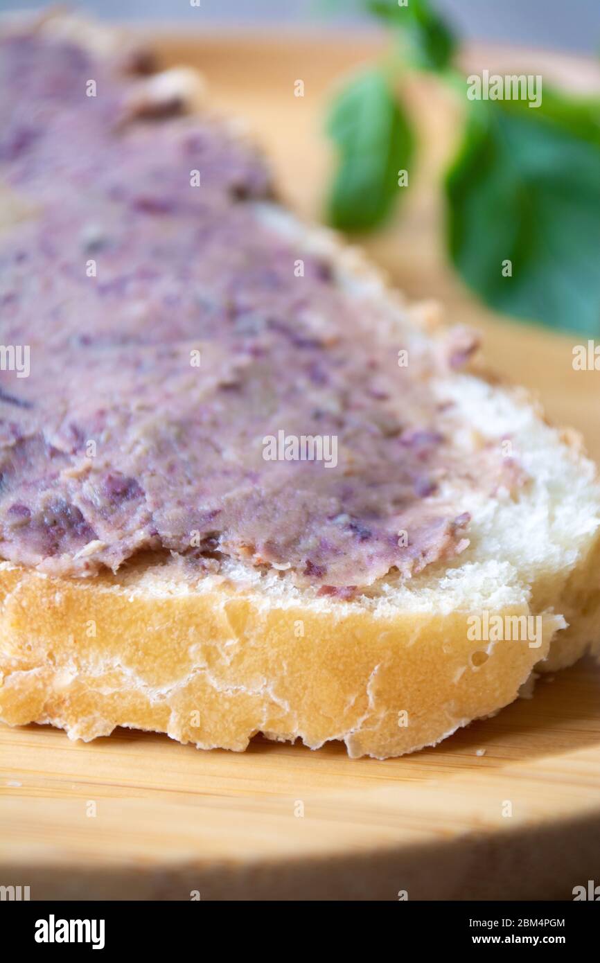 Vegan protein-packed bean pate paste spread on a slice of bread Stock ...