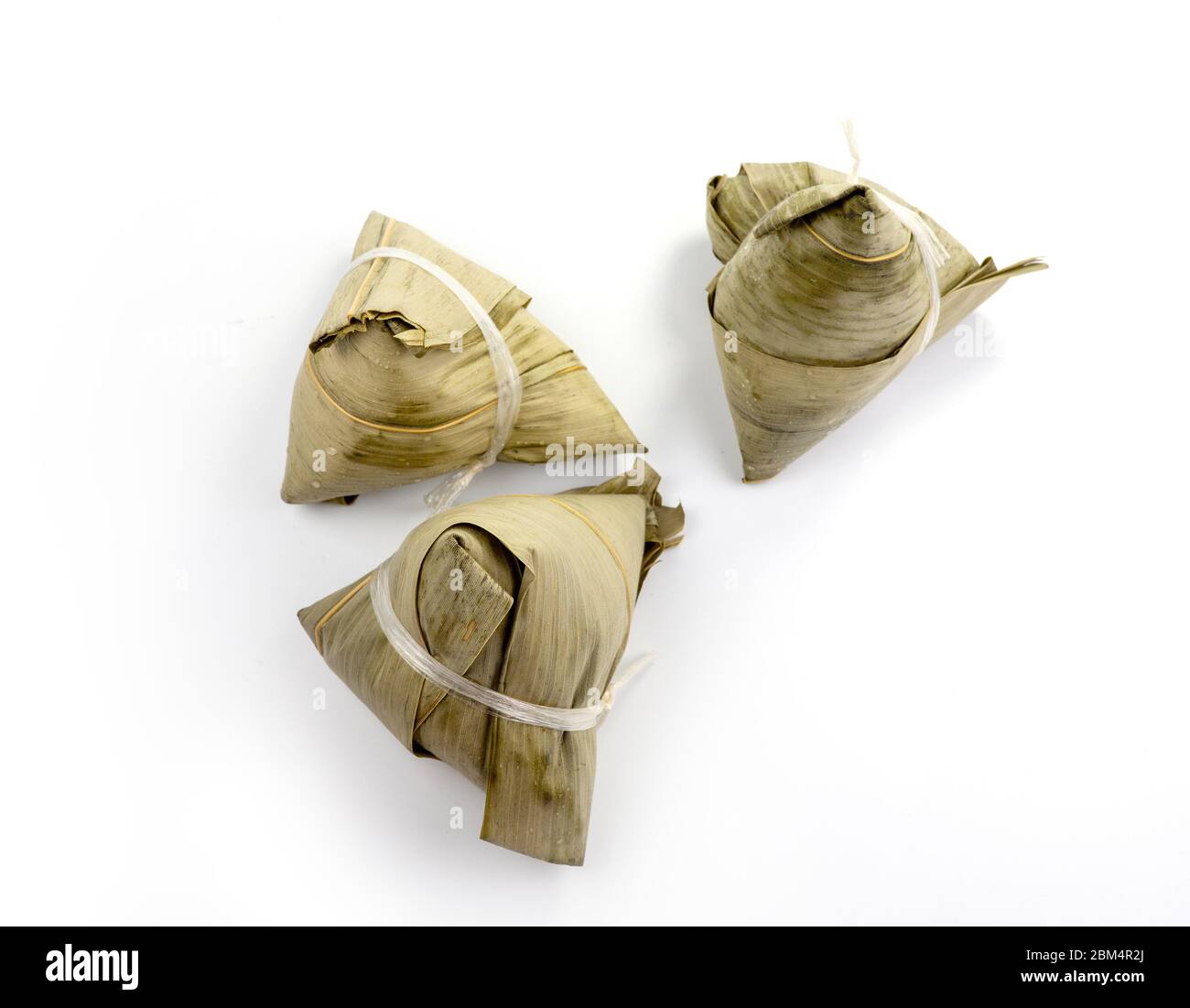 traditional wrapped sticky rice dumpling on white background, Dragon ...