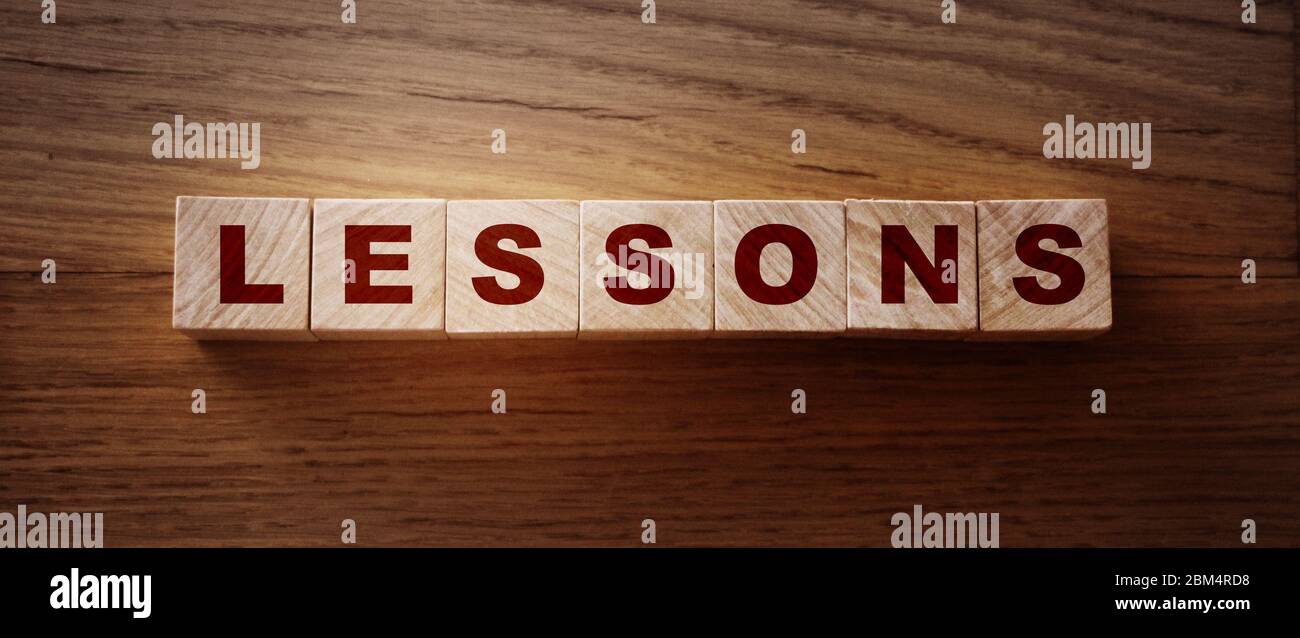 Lessons Word Written In Wooden Cubes. Learning concept Stock Photo - Alamy