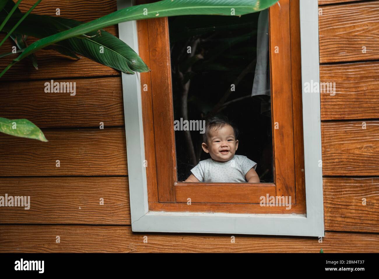 Child Peeking Window High Resolution Stock Photography and Images - Alamy