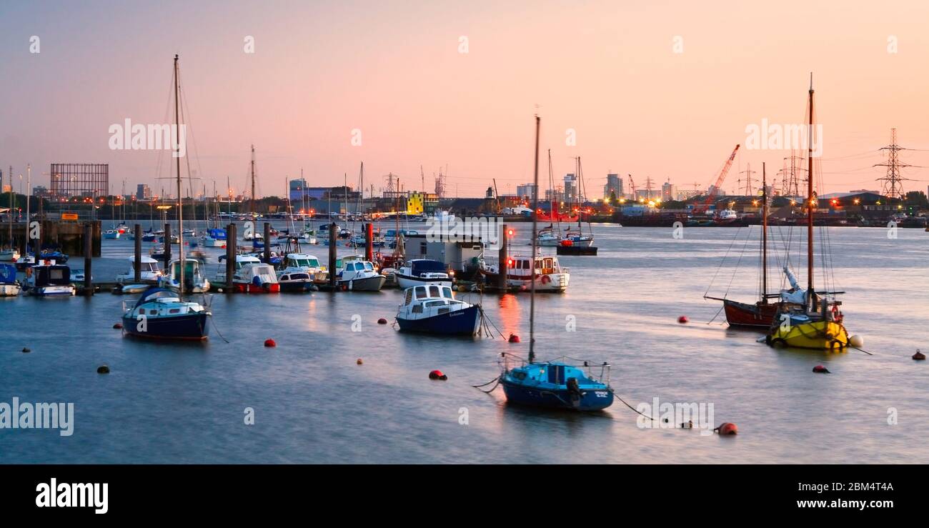 Boats on river Thames in North Greenwich on early morning Stock Photo ...