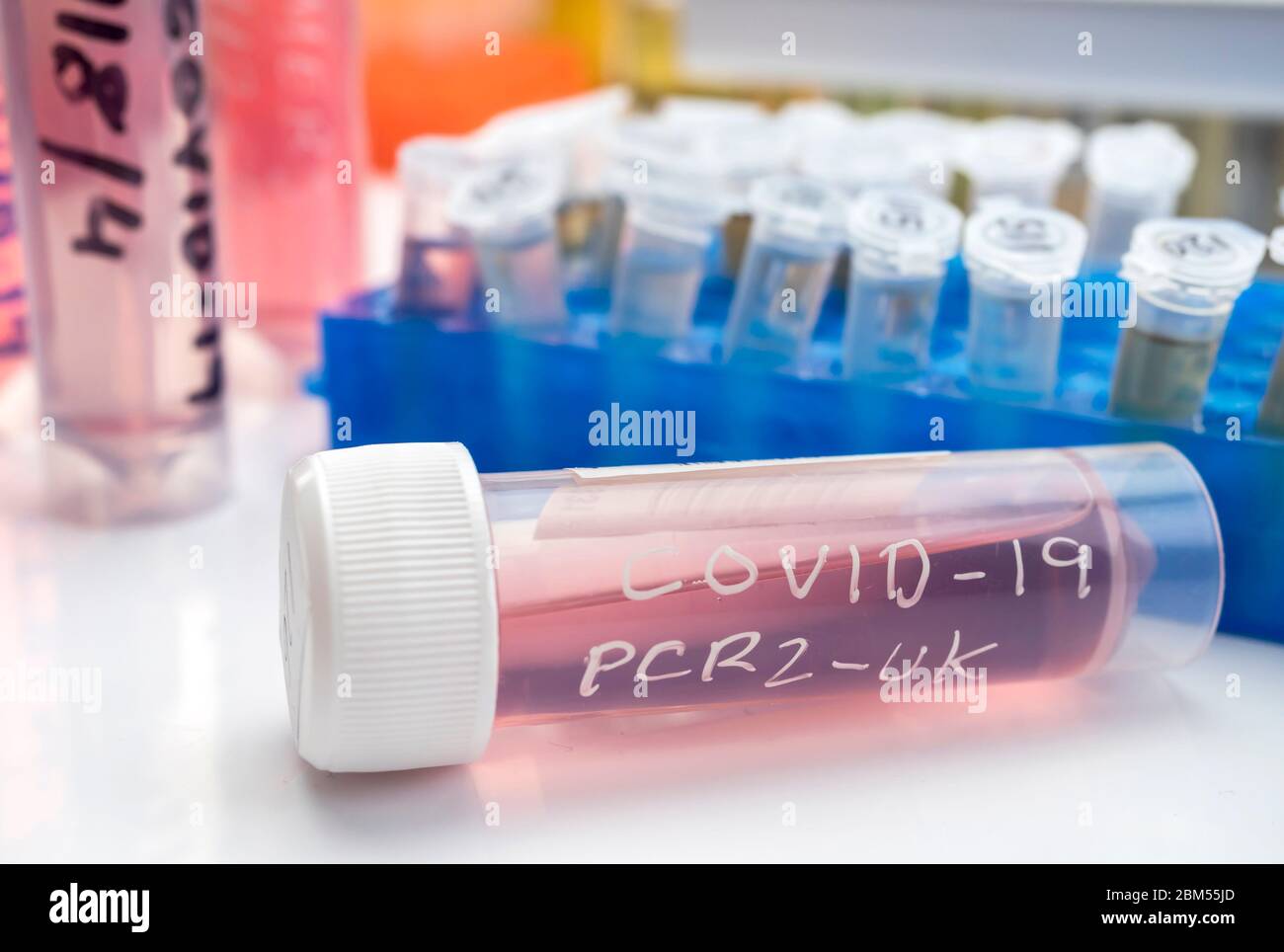 Vials with samples of SARS-COV-2 Covid-19 in a research laboratory ...