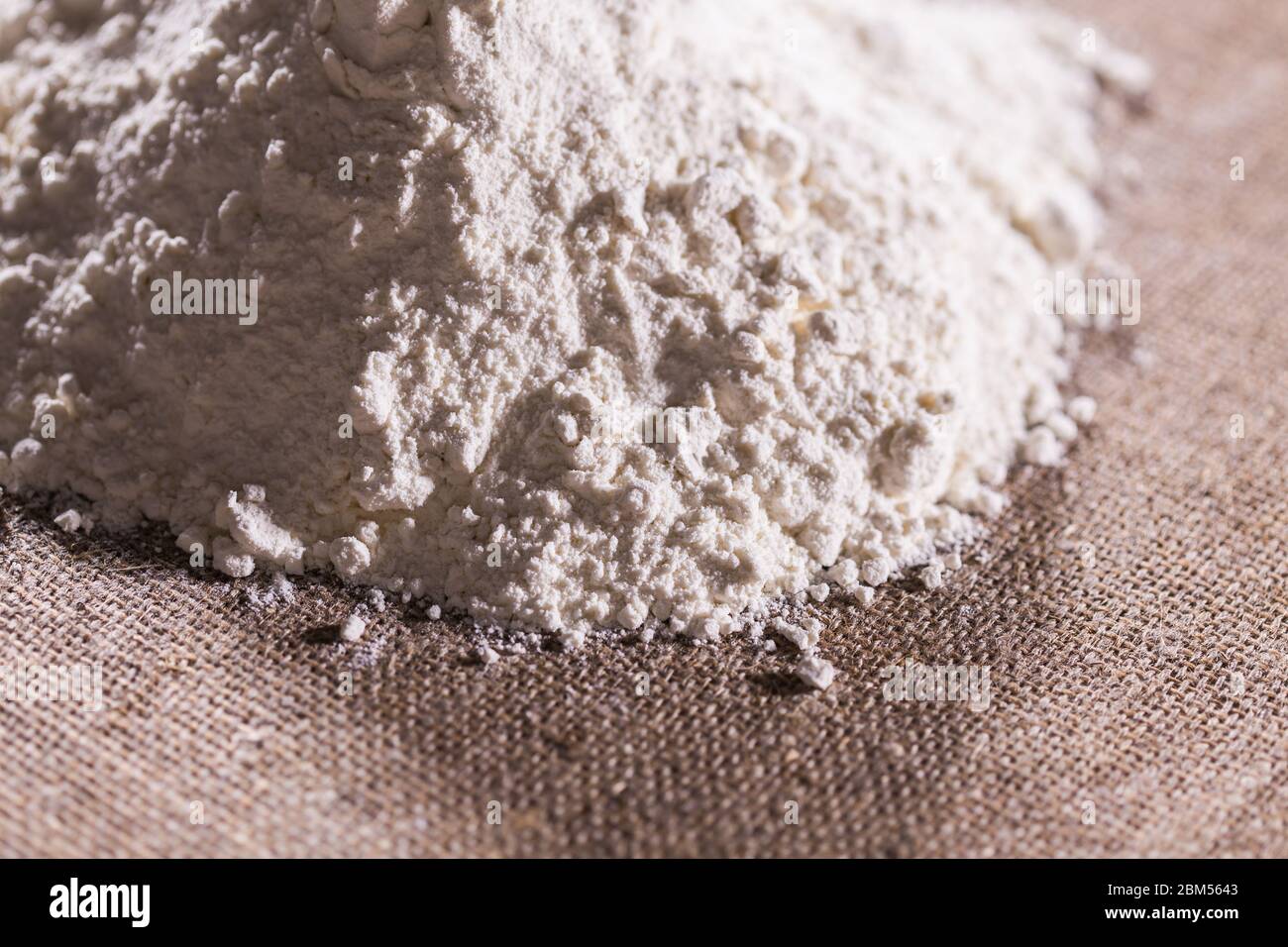 White flour on textile background texture photo Stock Photo - Alamy