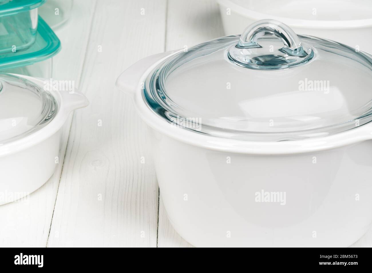 White pot cookware in a kitchen interior Stock Photo - Alamy