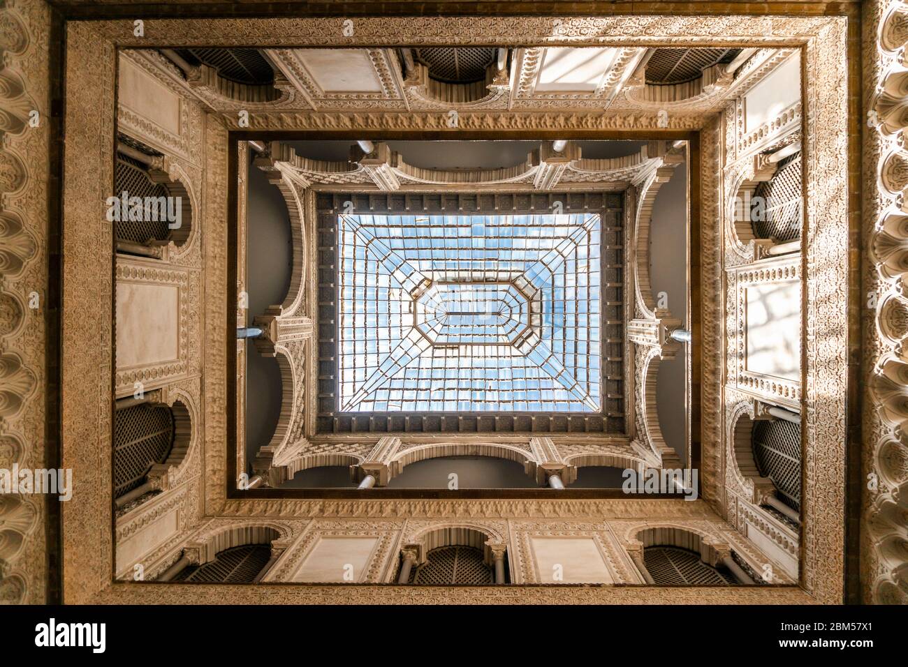 Moorish architecture of beautiful castle called Real Alcazar in Seville ...