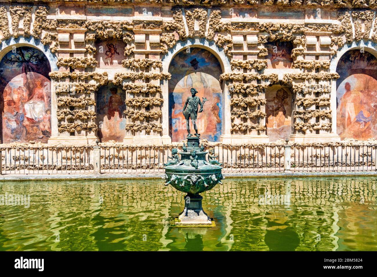 Moorish architecture of beautiful castle called Real Alcazar in Seville ...