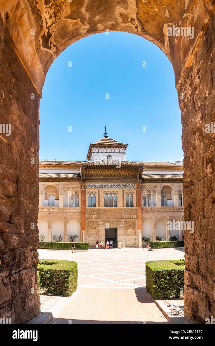 Moorish architecture of beautiful castle called Real Alcazar in Seville ...