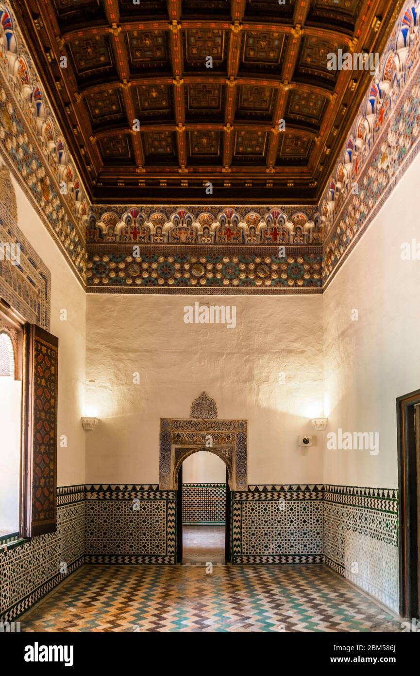 Moorish architecture of beautiful castle called Real Alcazar in Seville ...