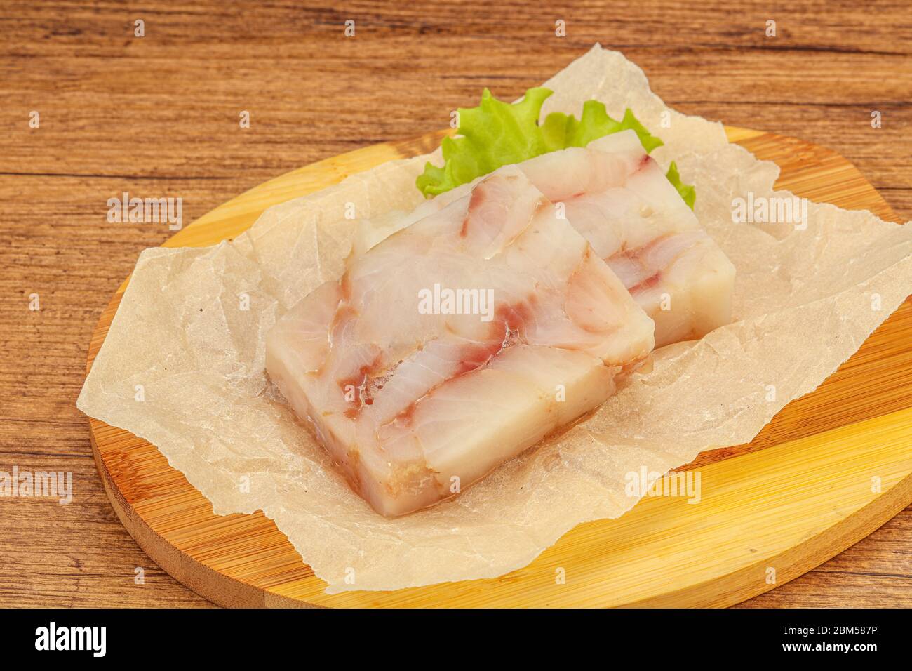 Raw dietary pollock fish fillet for cooking Stock Photo - Alamy