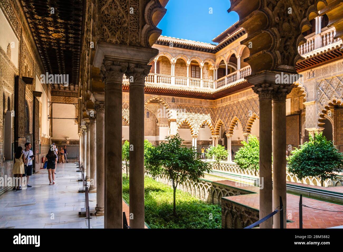 Moorish architecture of beautiful castle called Real Alcazar in Seville ...