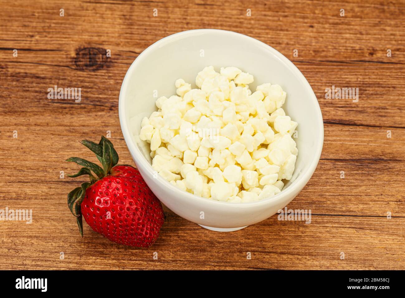 Dietary food - grain cottage cheese in the bowl Stock Photo - Alamy