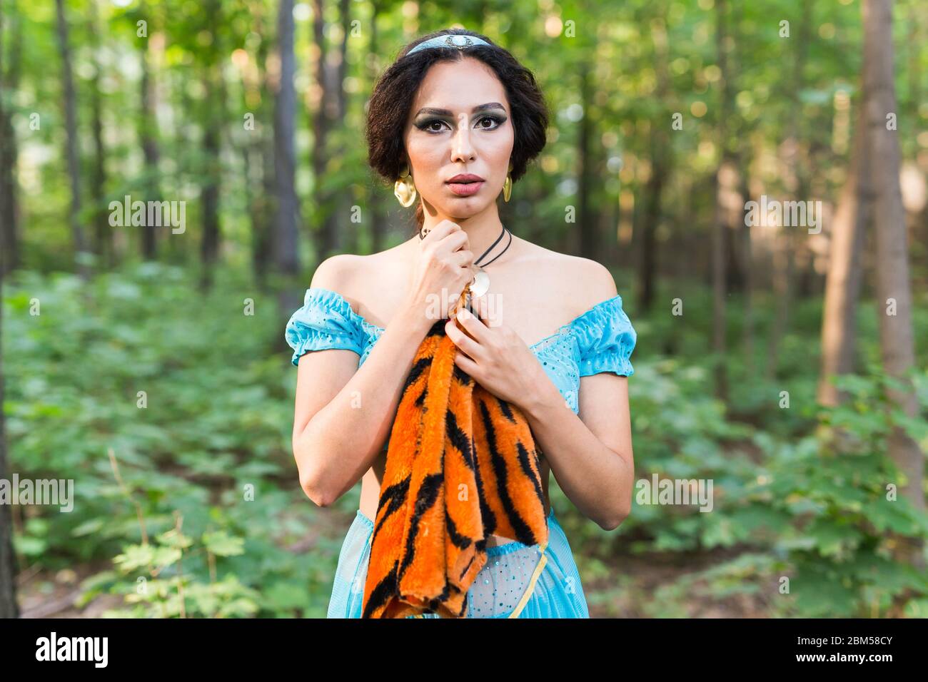 Stop animal killing concept - Pretty girl show animal skin that she ...