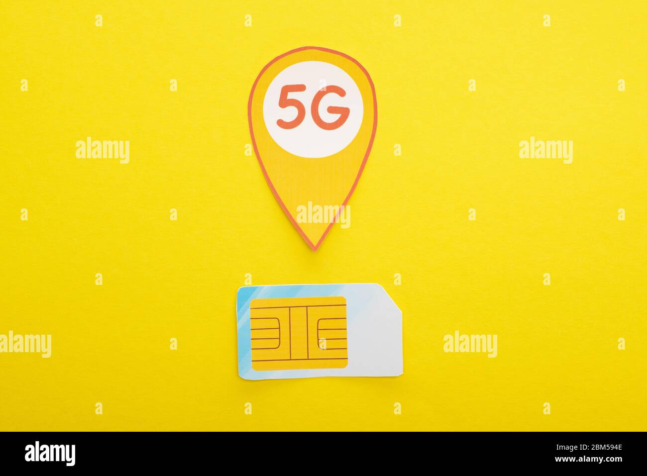 top view of sim card and 5g lettering on yellow background Stock Photo ...