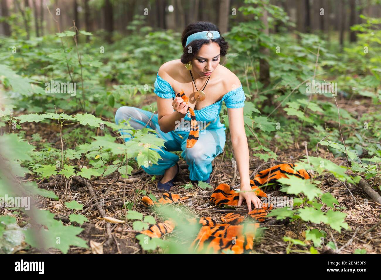 Stop animal killing concept - Pretty girl show animal skin that she ...