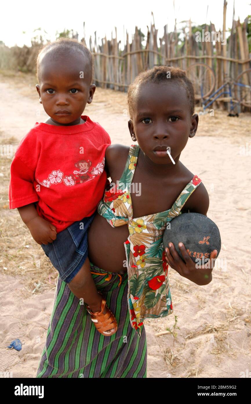 Children playing football near the Gunjar Project, Gunjar, Gambia ...