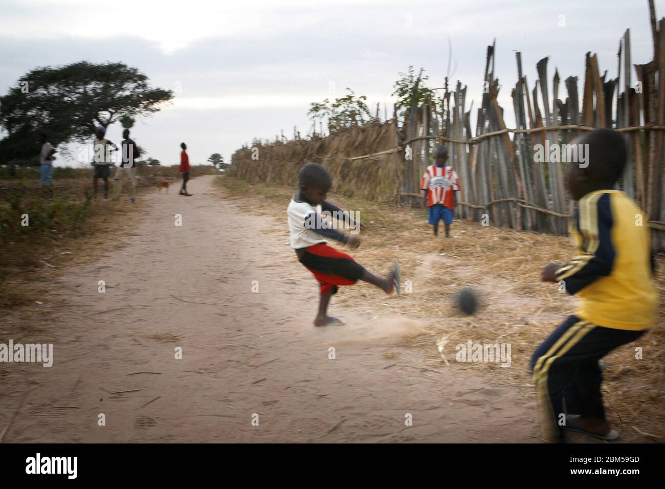 Children playing near the Gunjar Project, Gunjar, Gambia Stock Photo ...