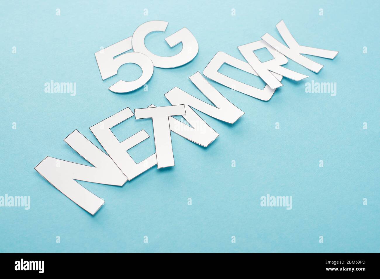 white 5g network lettering on blue background Stock Photo - Alamy