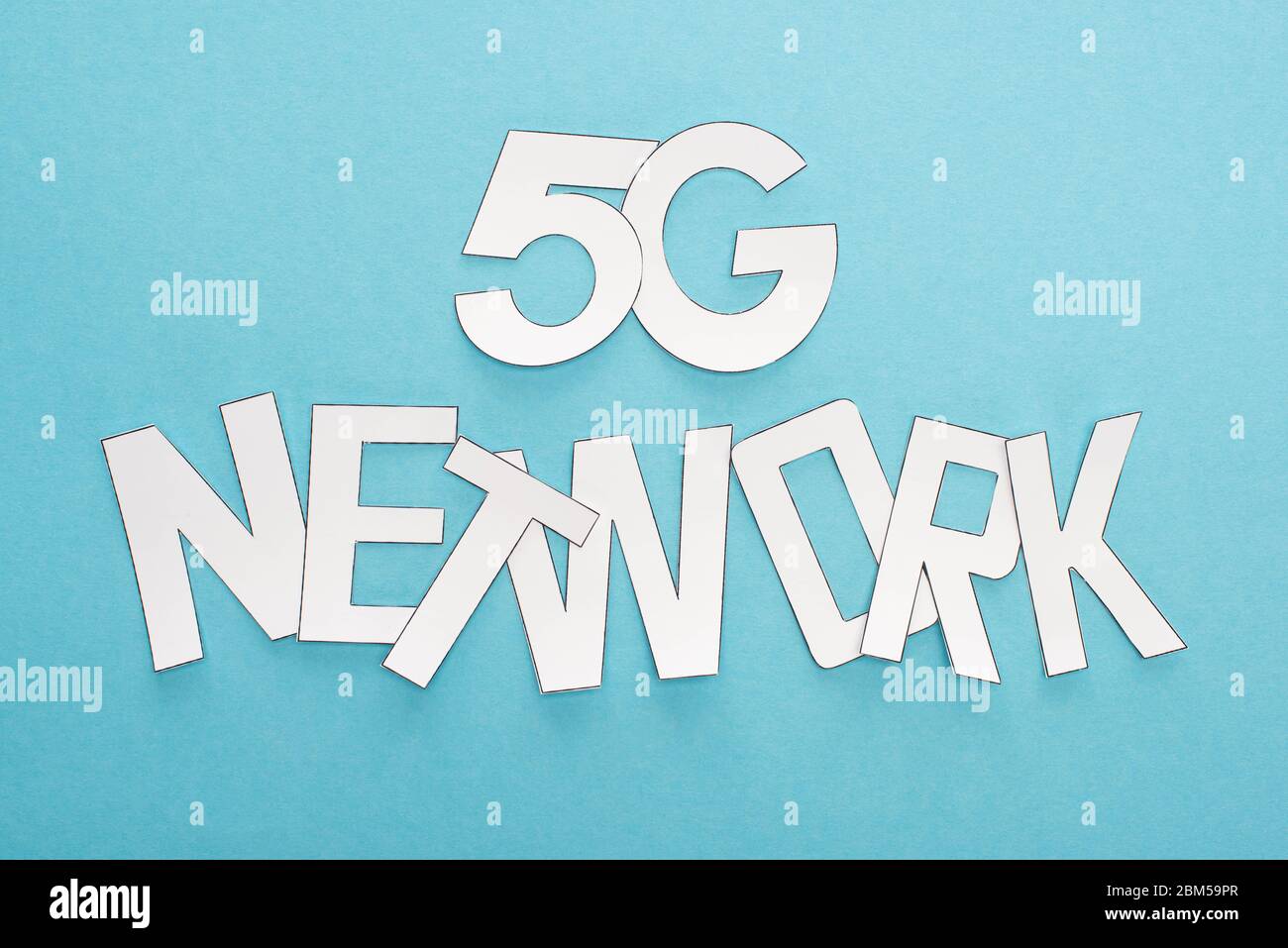 top view of white 5g network lettering on blue background Stock Photo ...