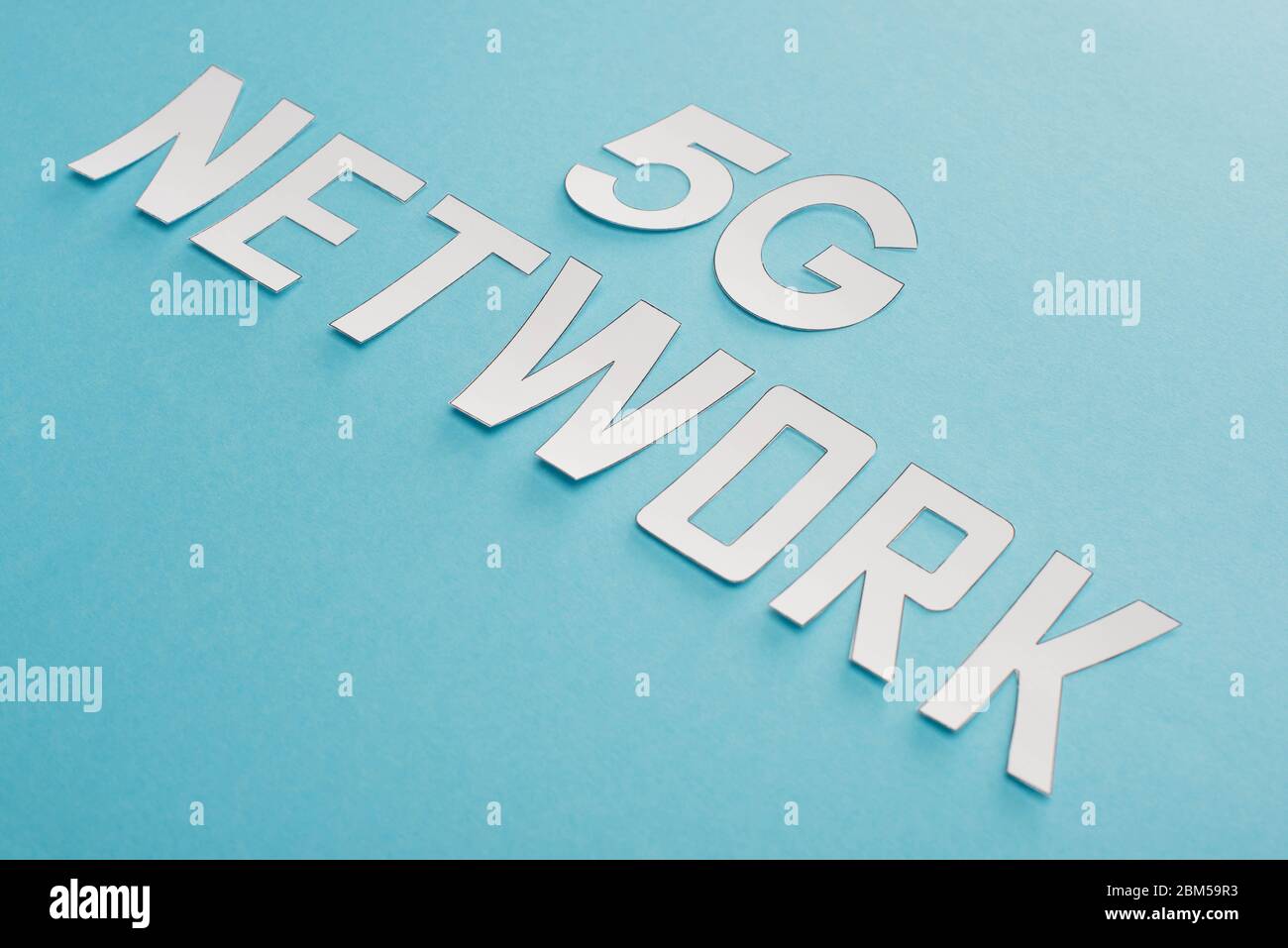 white 5g network lettering on blue background Stock Photo - Alamy