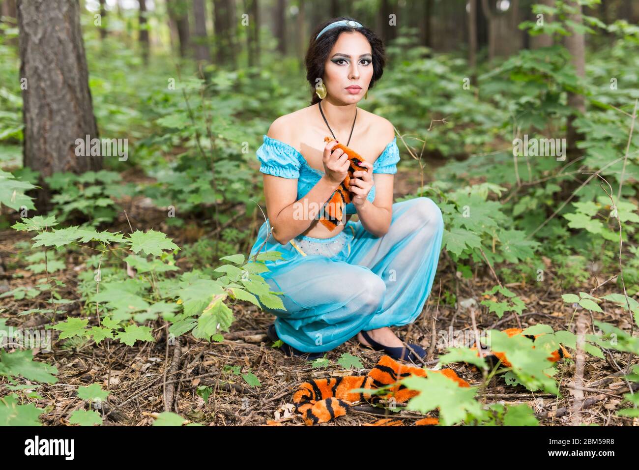 Stop animal killing concept - Pretty girl show animal skin that she ...