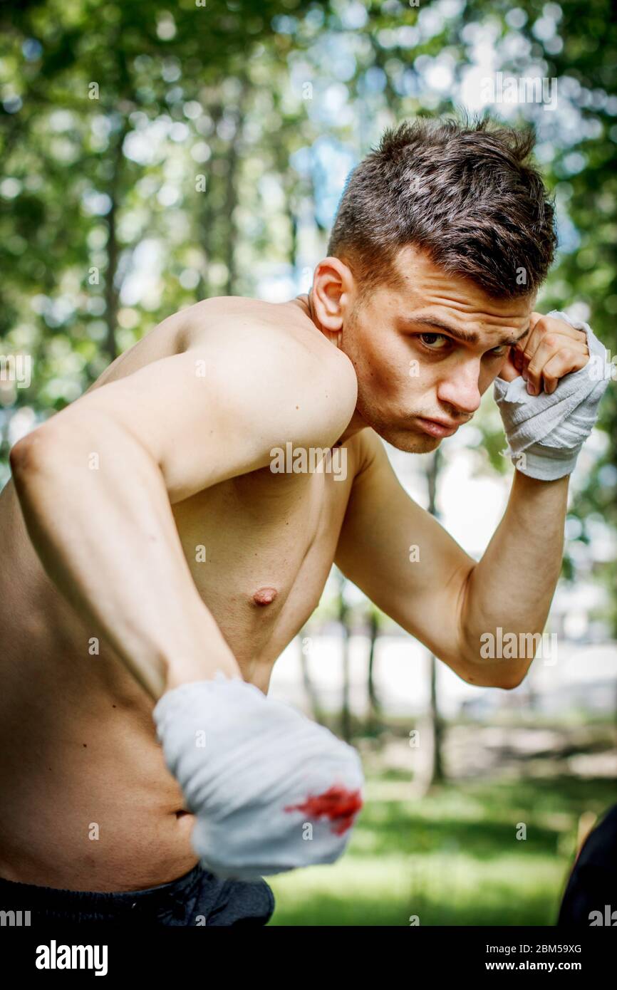 aggressive boxer diligently trains hands in blood Stock Photo - Alamy
