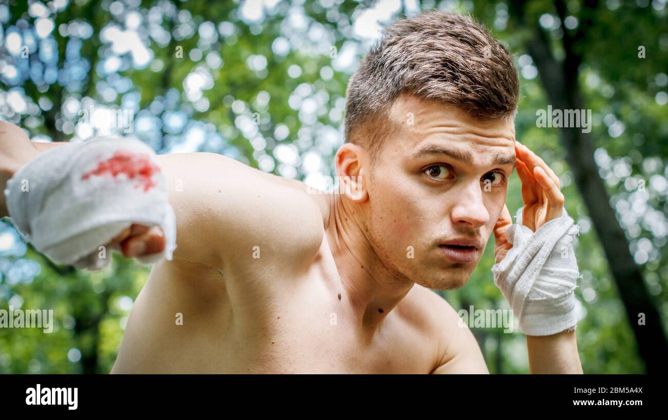 aggressive boxer diligently trains hands in blood Stock Photo - Alamy