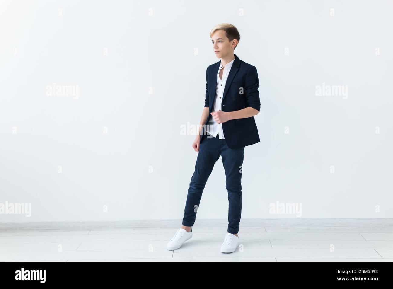 Puberty concept - Teenage boy portrait on a white background Stock ...