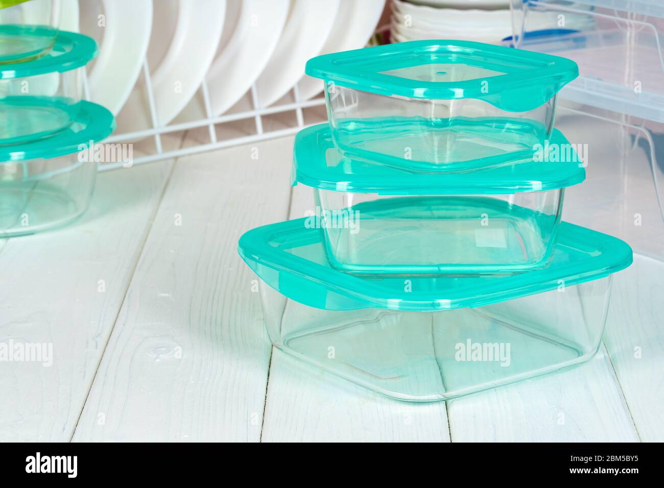 Clean kitchen with various plates and food boxes Stock Photo - Alamy