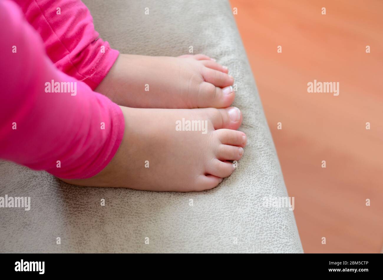 Close Up Of Feet Of Child Stock Photo - Alamy