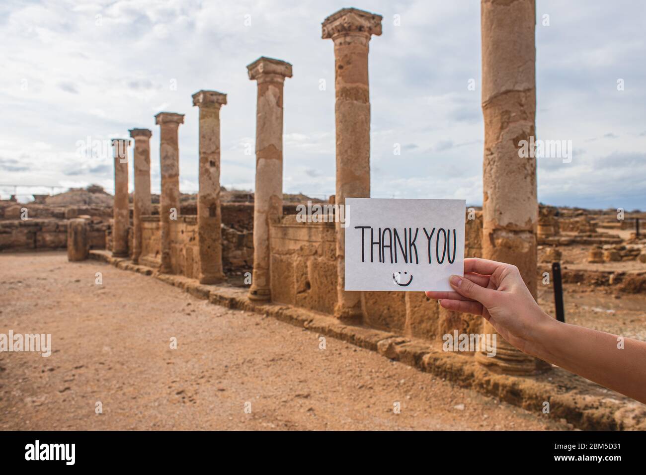 PAPHOS, CYPRUS - MARCH 31, 2020: cropped view of woman holding paper ...