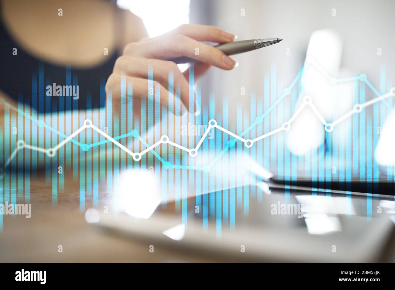 Double exposure economic charts and graphs on virtual screen. Online ...
