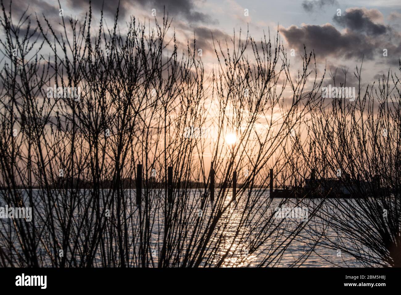 beautiful sunset over a river Stock Photo - Alamy