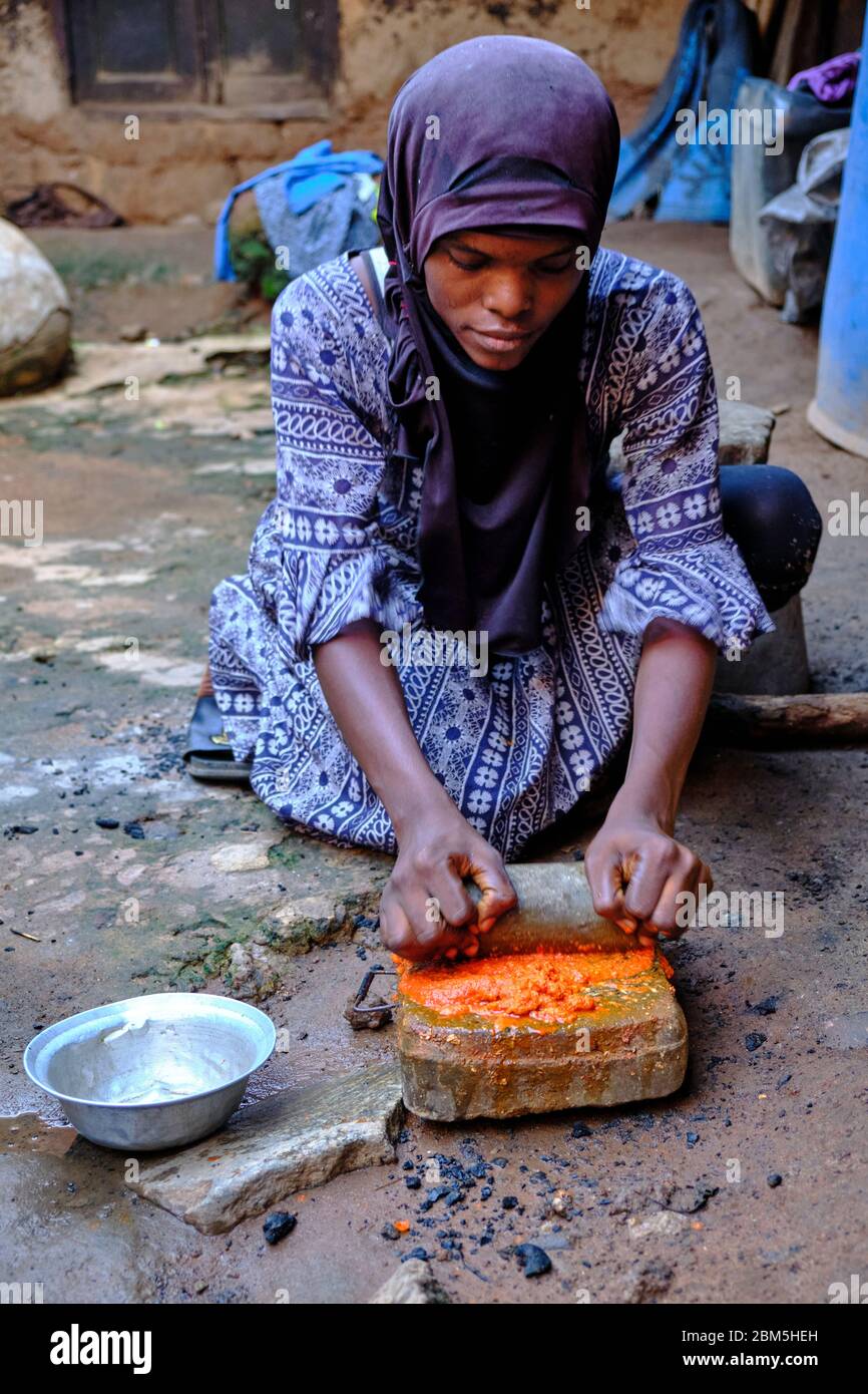 Woman grinding spices hi-res stock photography and images - Alamy