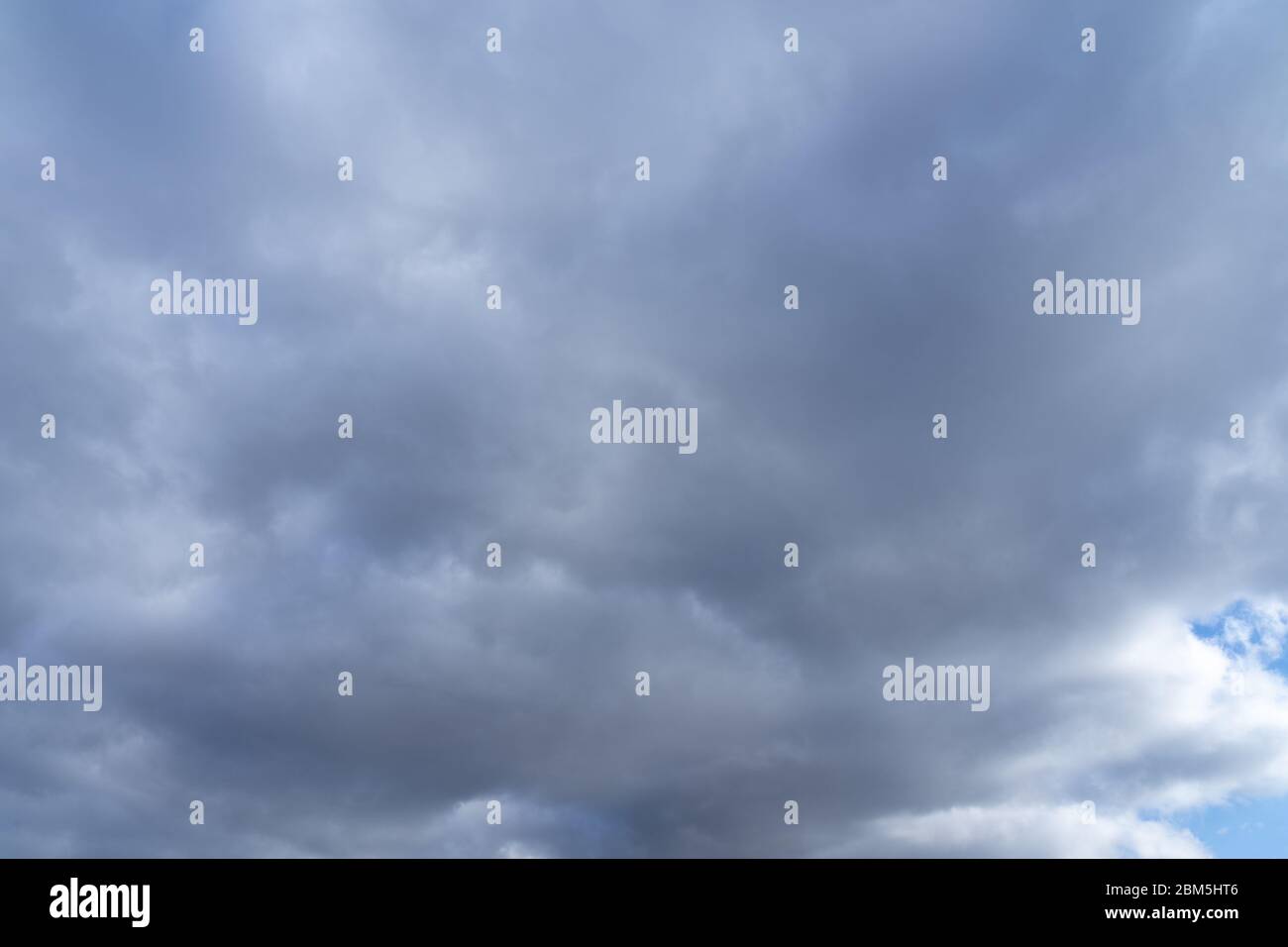 Cloudy heavy dark gray sky. sky before a thunderstorm Stock Photo - Alamy