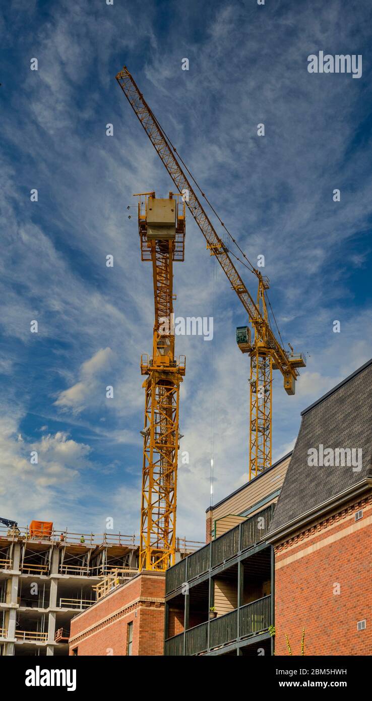 Tower cranes concrete building construction hi-res stock photography ...
