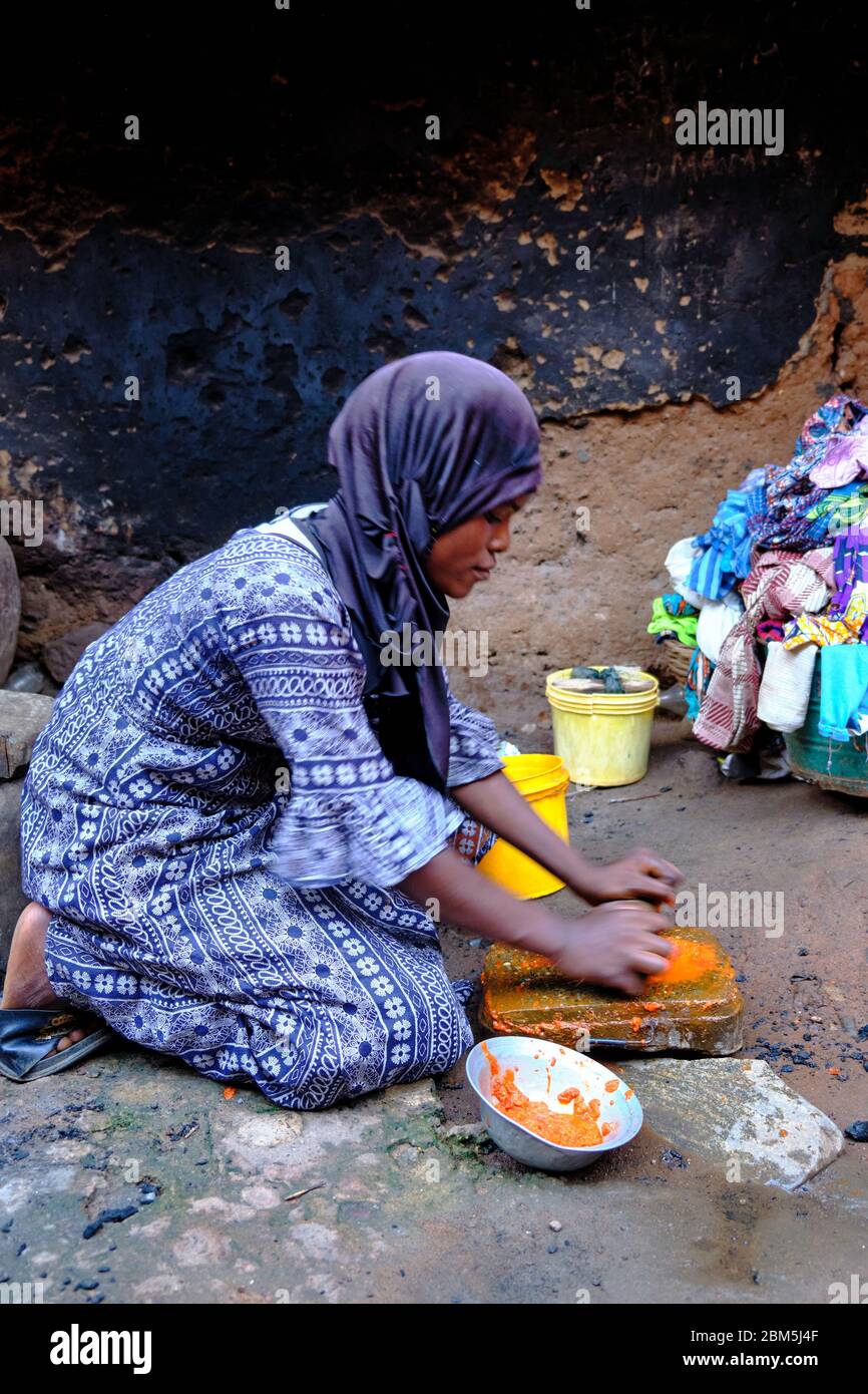 Woman grinding spices hi-res stock photography and images - Alamy