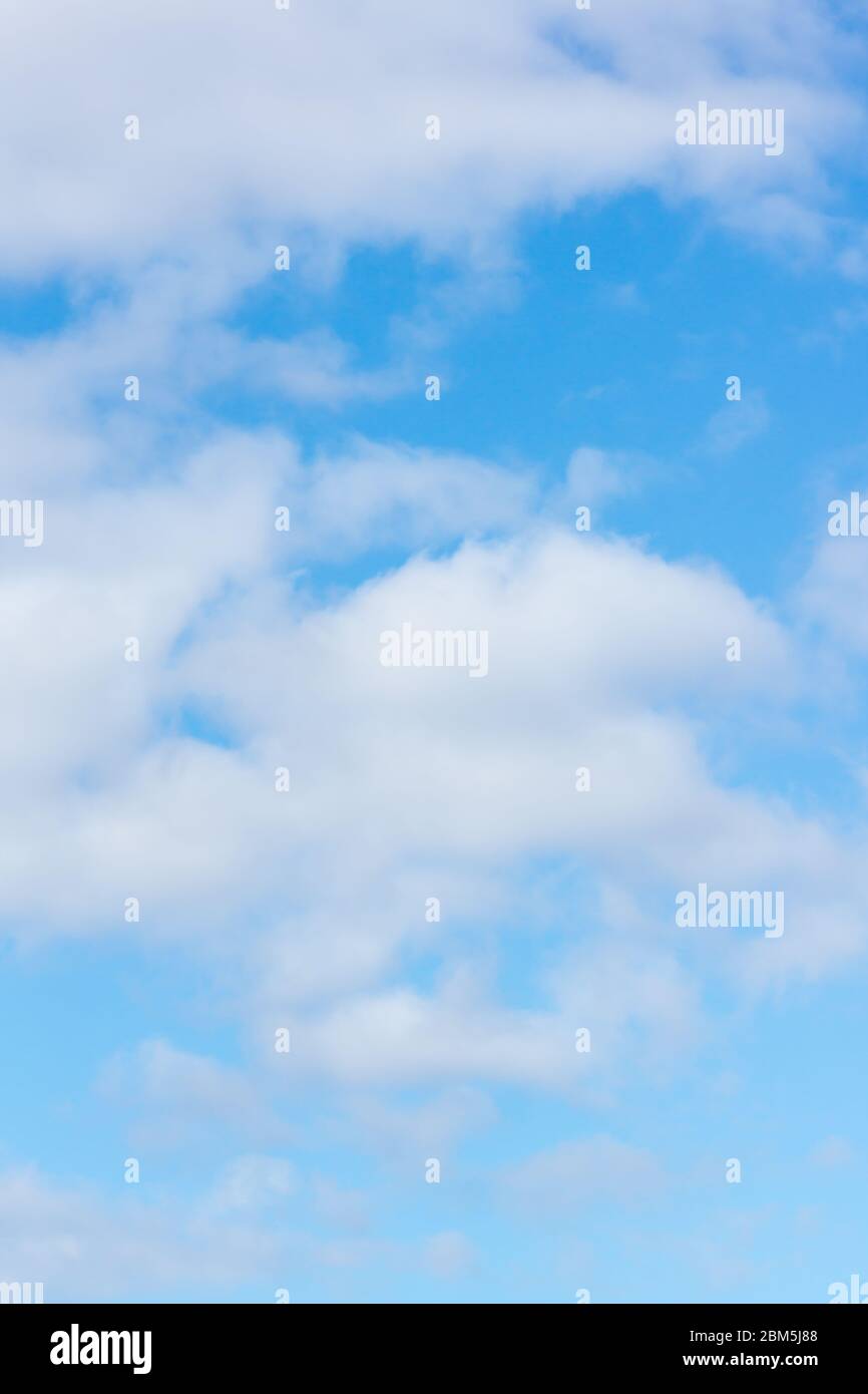 blue sky with flying white light clouds Stock Photo - Alamy