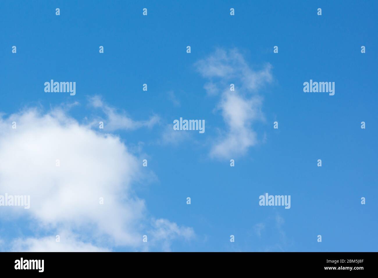 blue sky with flying white light clouds Stock Photo - Alamy