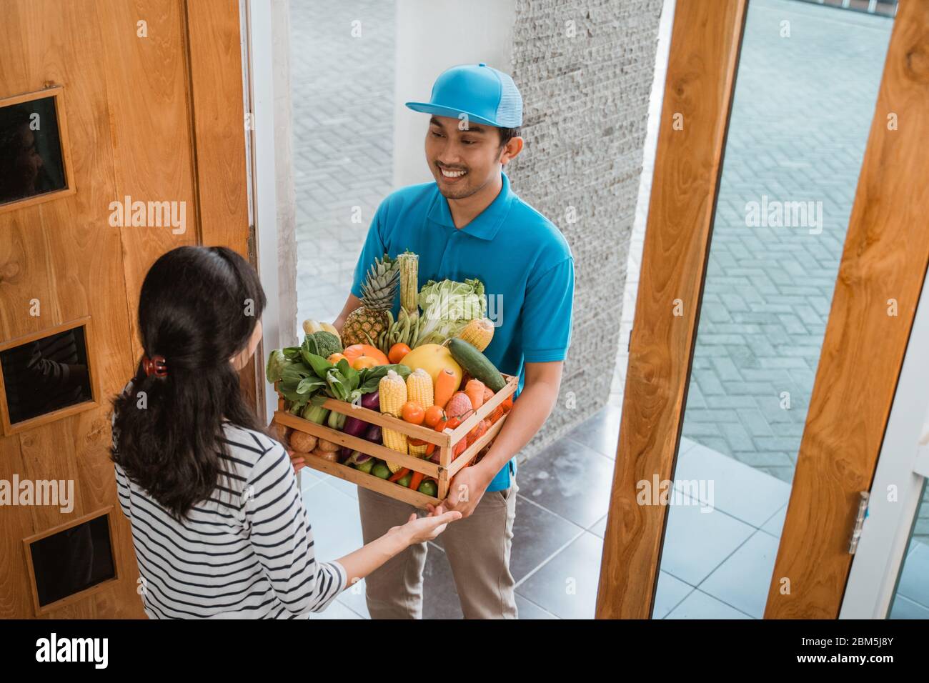 Happy Customer Receiving Grocery High Resolution Stock Photography and ...